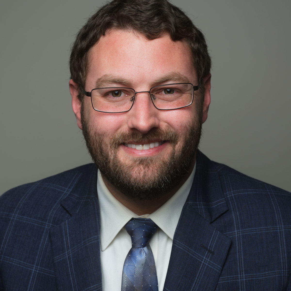 John E. Schneider - Wosnik Law